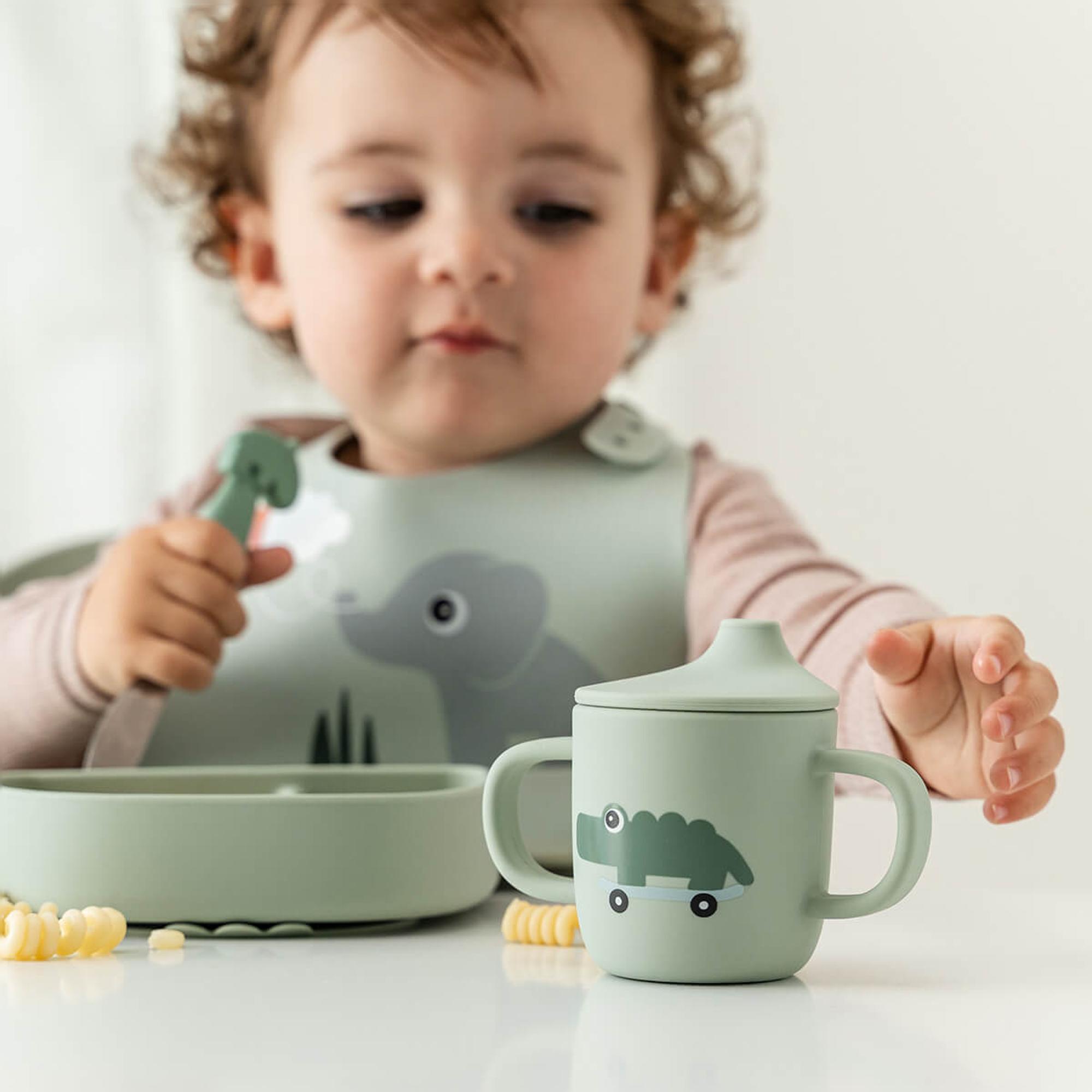 Taza de aprendizaje con asas y antideslizante Done by Deer silicona ...