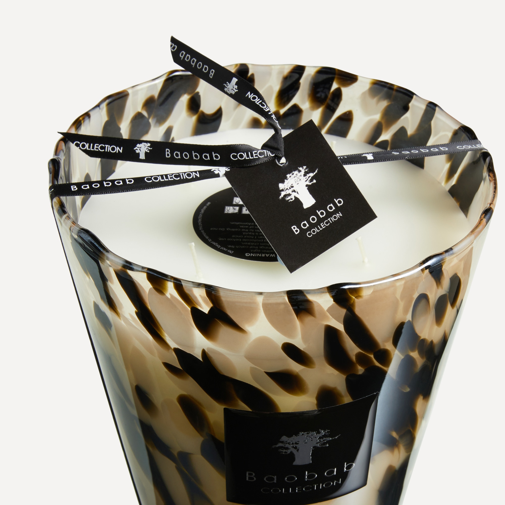 Vela perfumada Black Pearl Baobab Collection Blanco 24 cm · El Corte Inglés