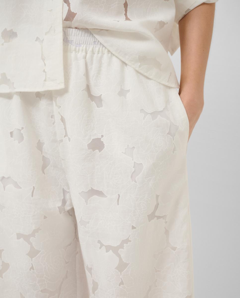 Pantalón de mujer palazzo devoré con estampado floral Blanco Roberto ...