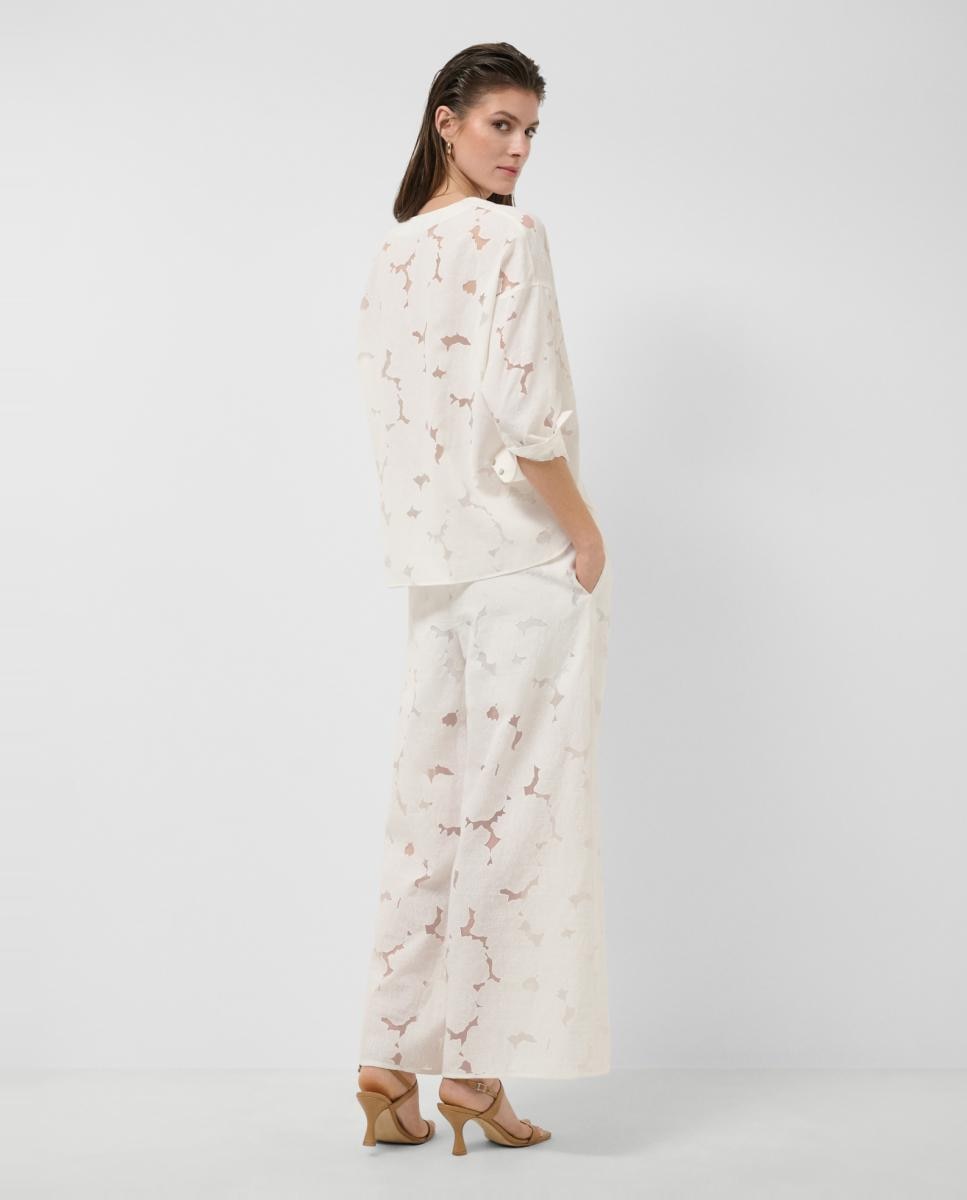 Pantalón de mujer palazzo devoré con estampado floral Blanco Roberto ...