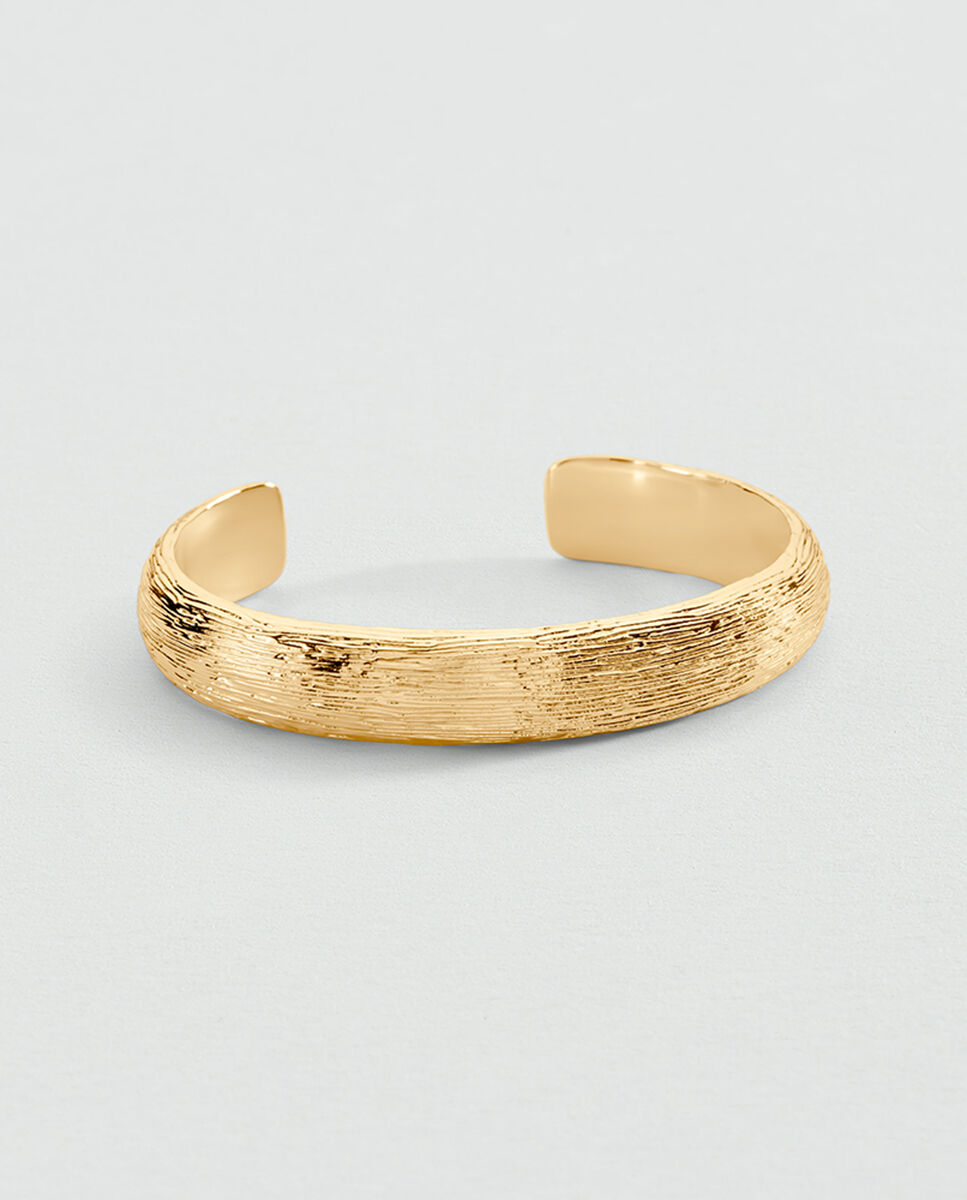 Pulsera rígida charlot abierta con textura y acabada en oro Dorado · El ...