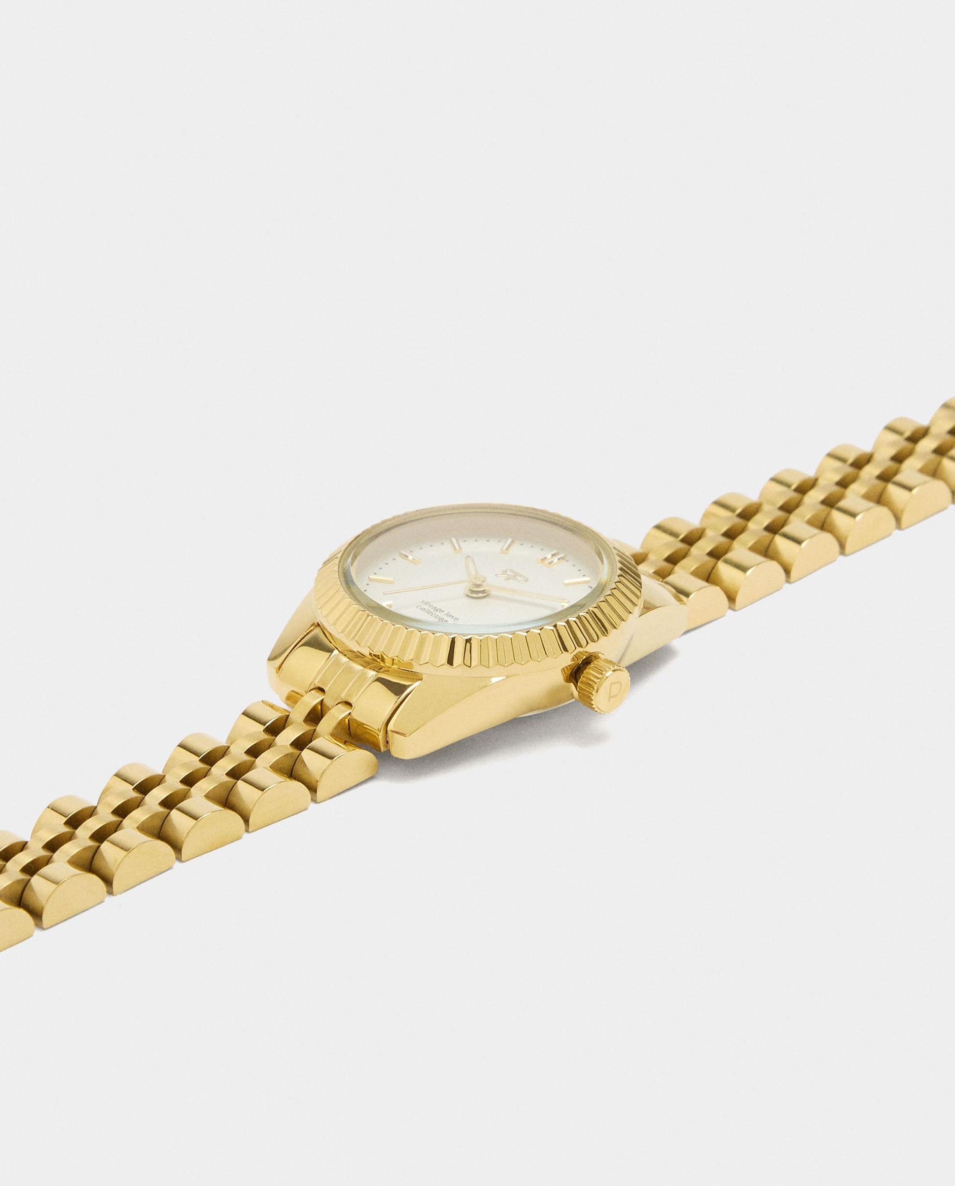 Reloj de mujer Parfois de acero inoxidable redondo en liso Dorado · El ...