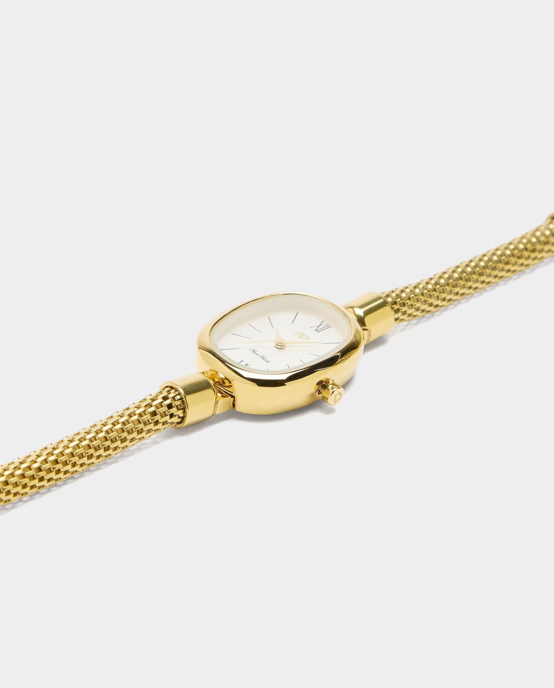 Reloj de mujer Parfois de acero inoxidable redondo en liso Dorado · El ...