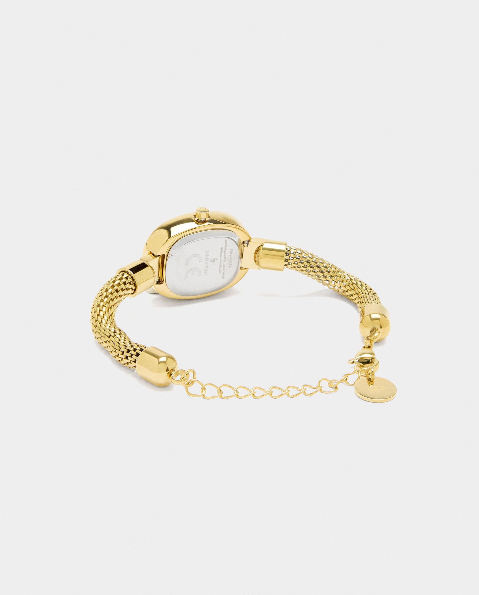 Reloj de mujer Parfois de acero inoxidable redondo en liso Dorado · El ...