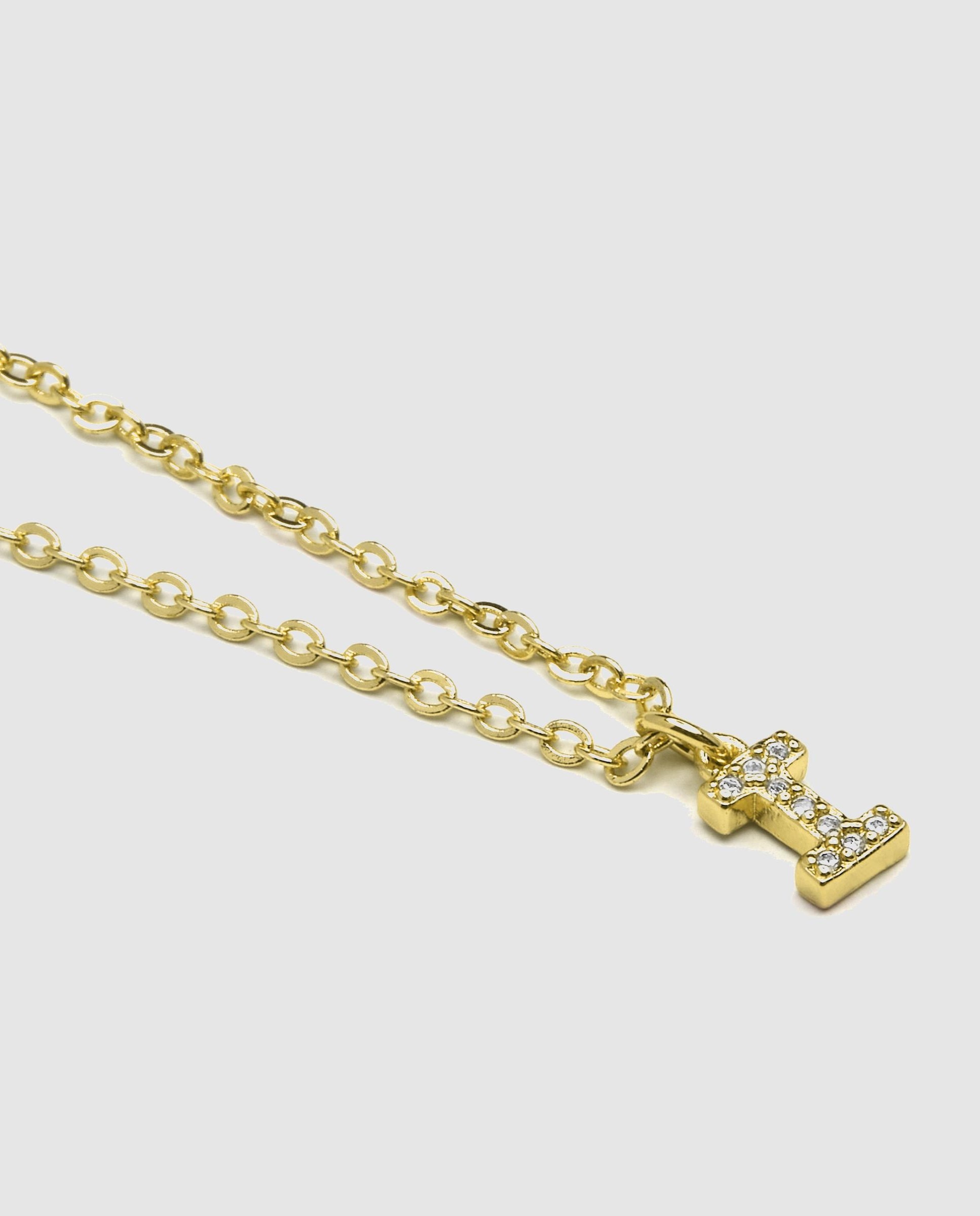 Collar letras acabado en oro amarillo de 18 quilates con circonita ...