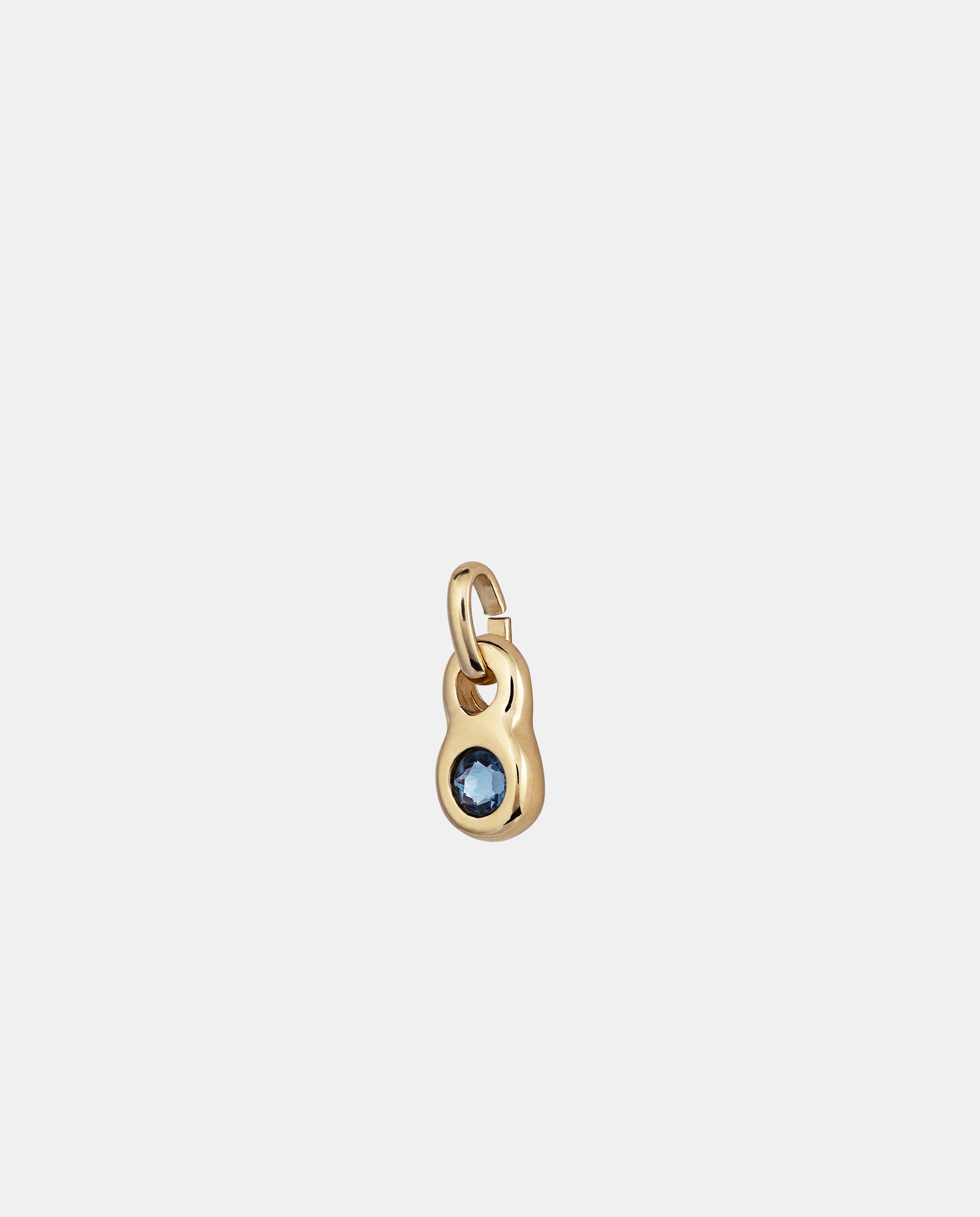 Charm bañado en oro 18k con forma redonda y un cristal Oro UNO de 50 ...