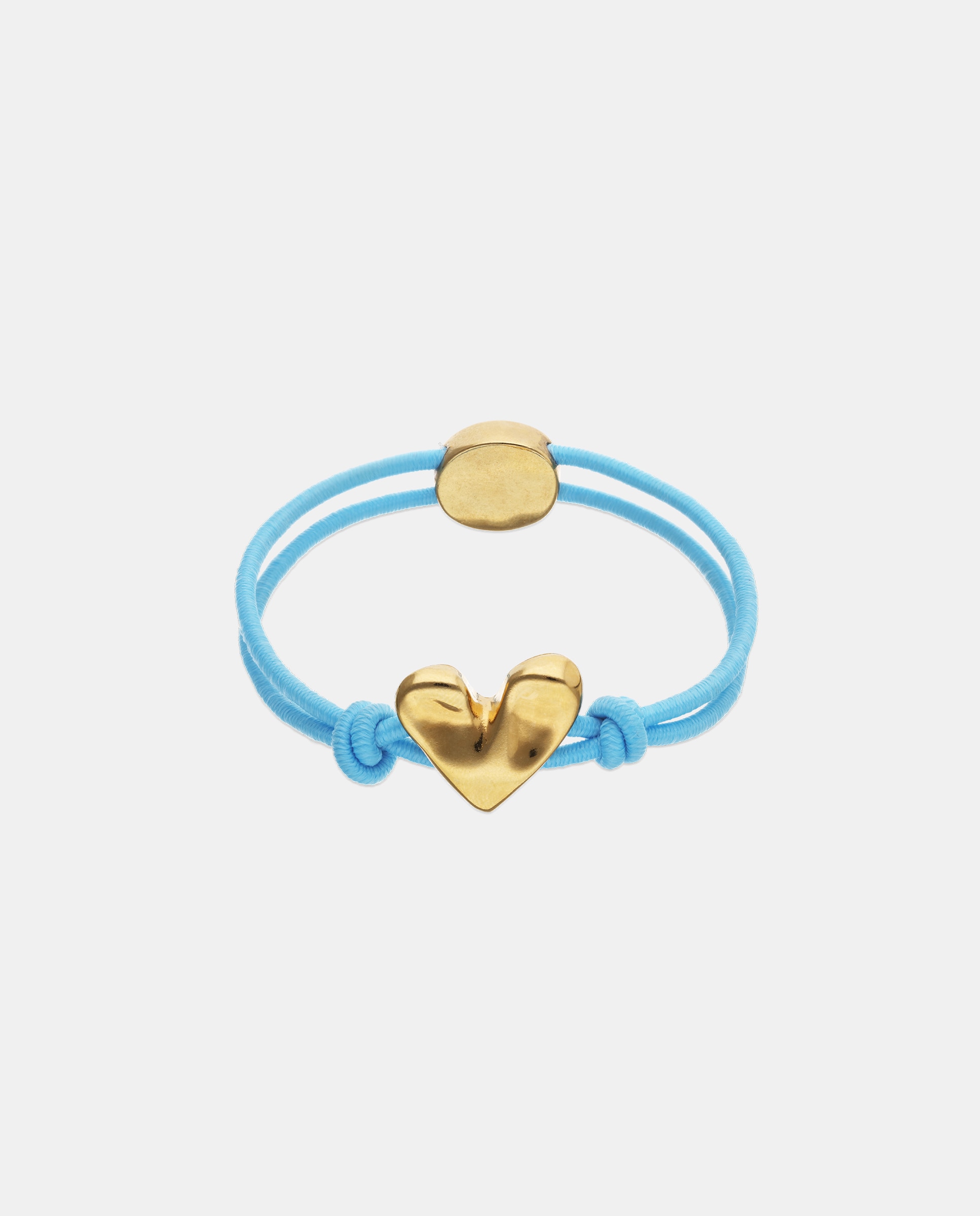 Pulsera de hilo elástico azul con corazón bañado en oro 18k Oro · El ...