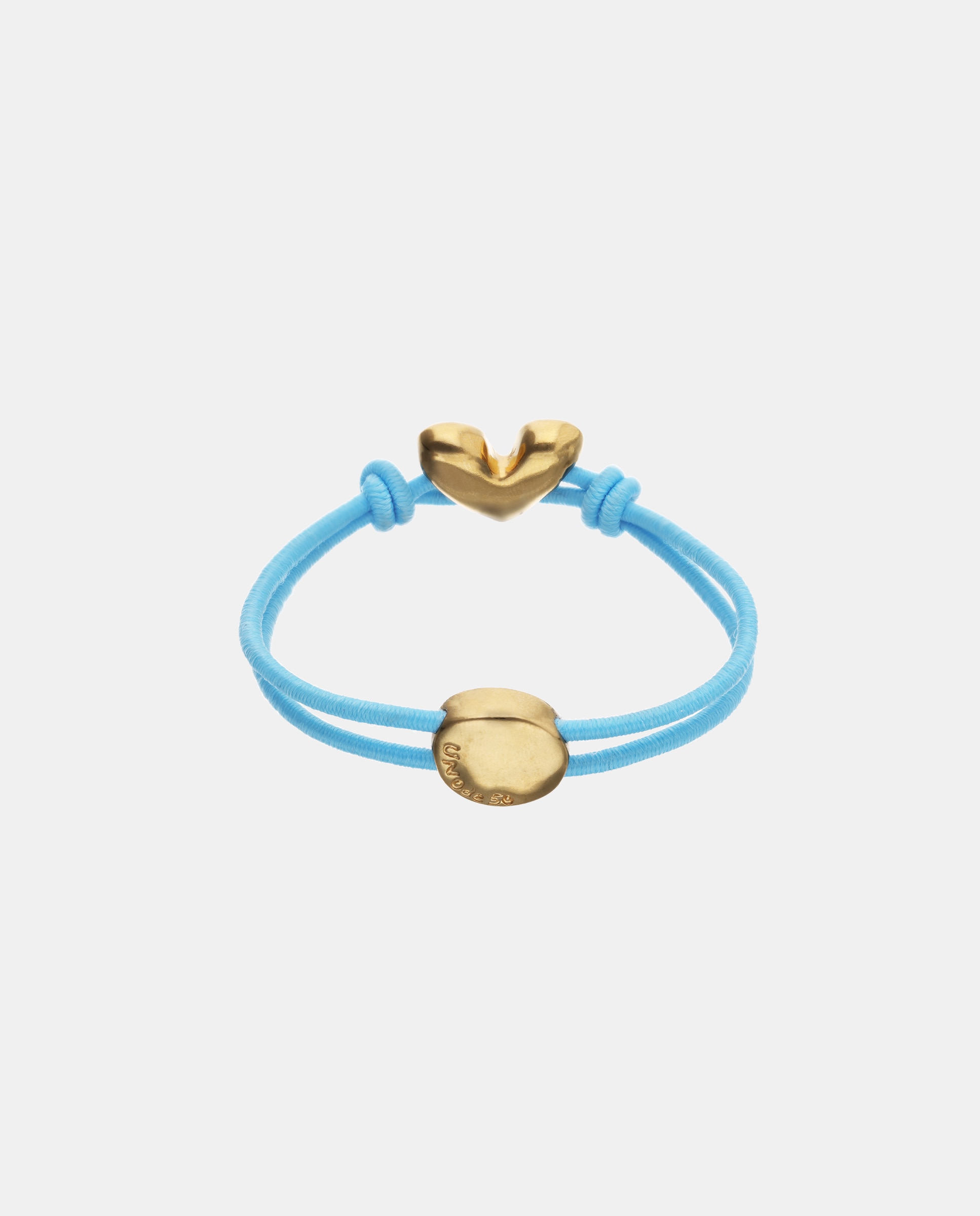 Pulsera de hilo elástico azul con corazón bañado en oro 18k Oro · El ...