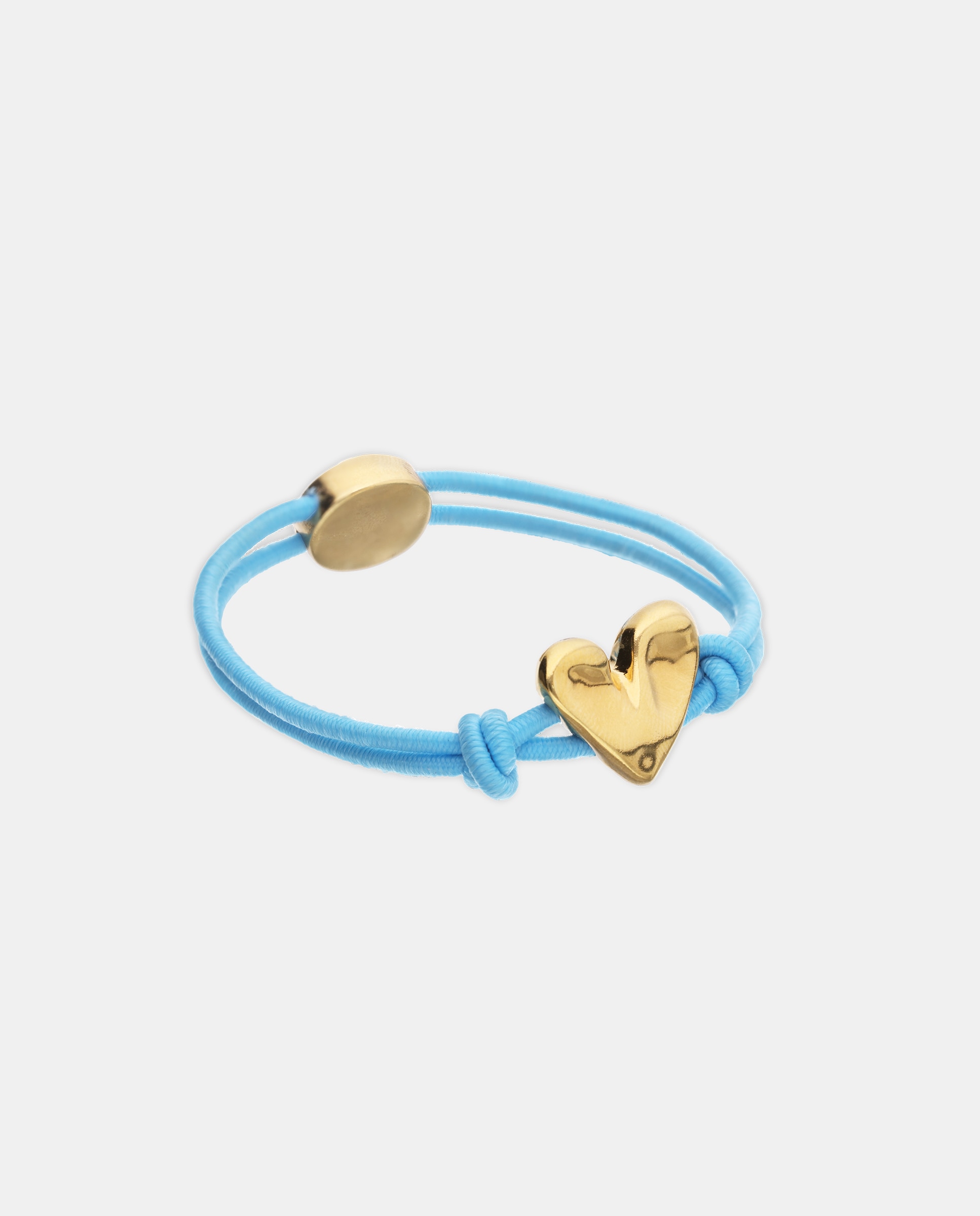 Pulsera de hilo elástico azul con corazón bañado en oro 18k Oro · El ...