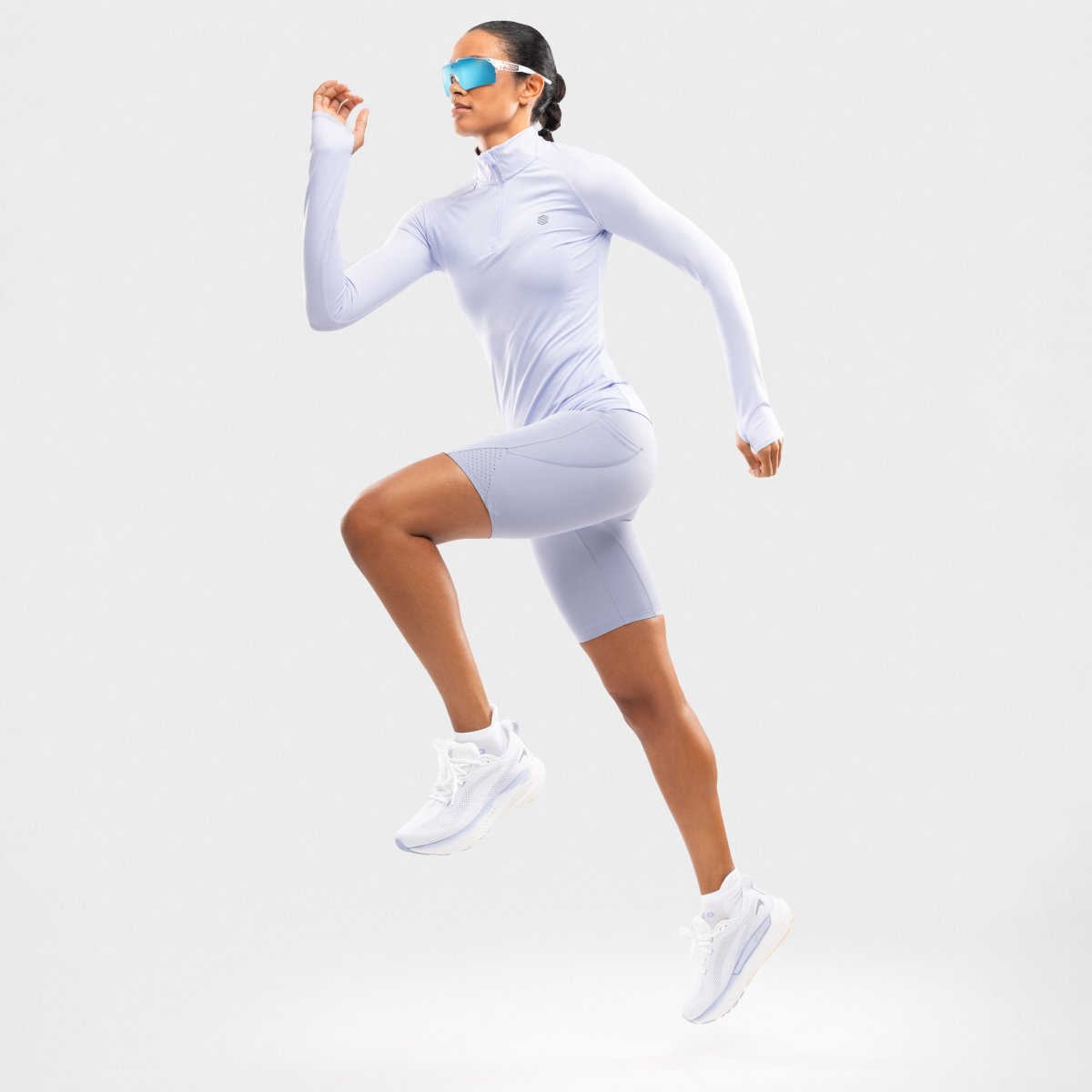 Mallas running cortas mujer Thames Siroko Morado · El Corte Inglés