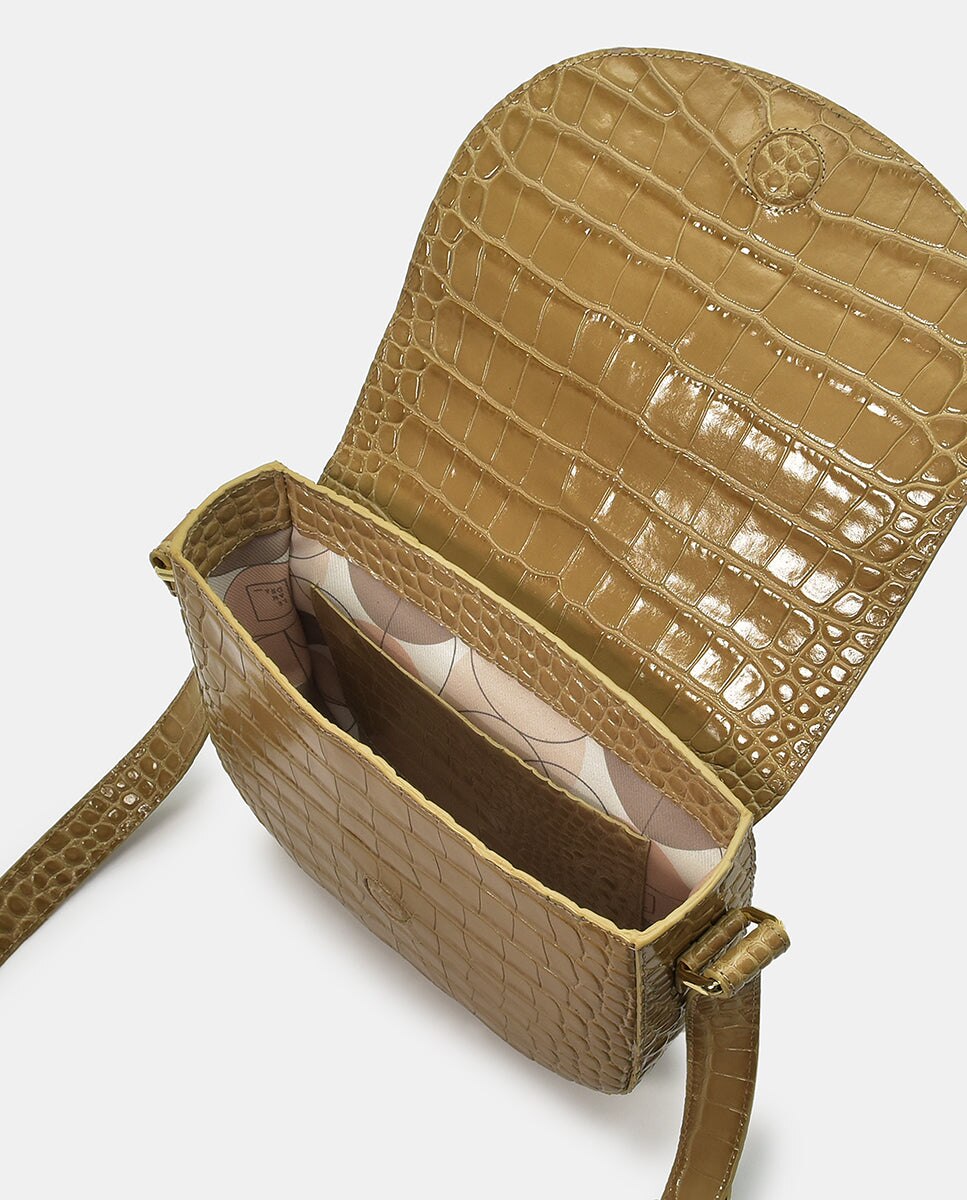 Bandolera de mujer de piel grabada en coco color arena · Leandra