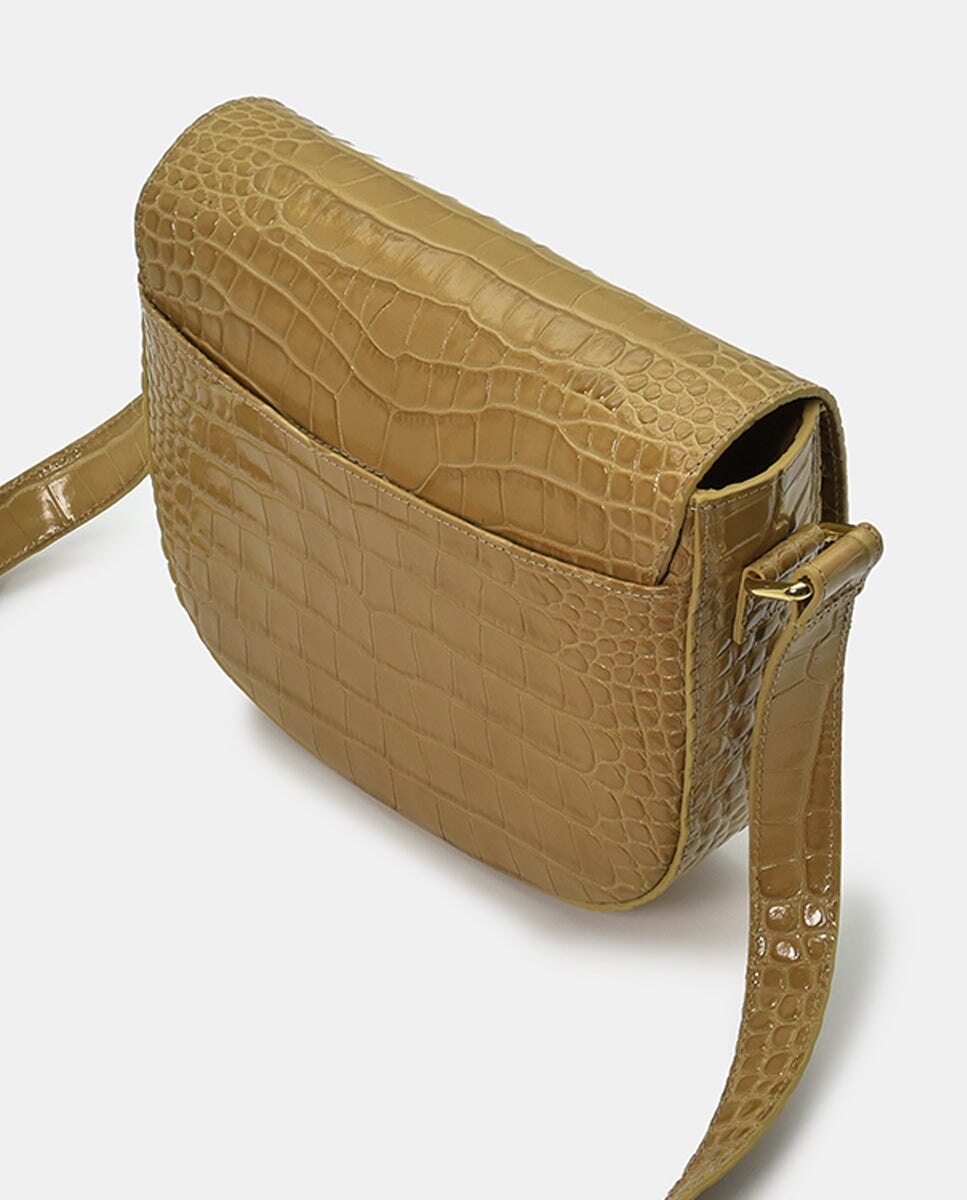 Bandolera de mujer de piel grabada en coco color arena · Leandra