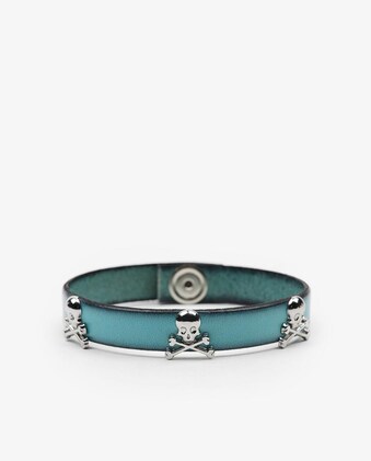 Pulsera de mujer de piel en azul con calaveras metálicas · Scalpers ...