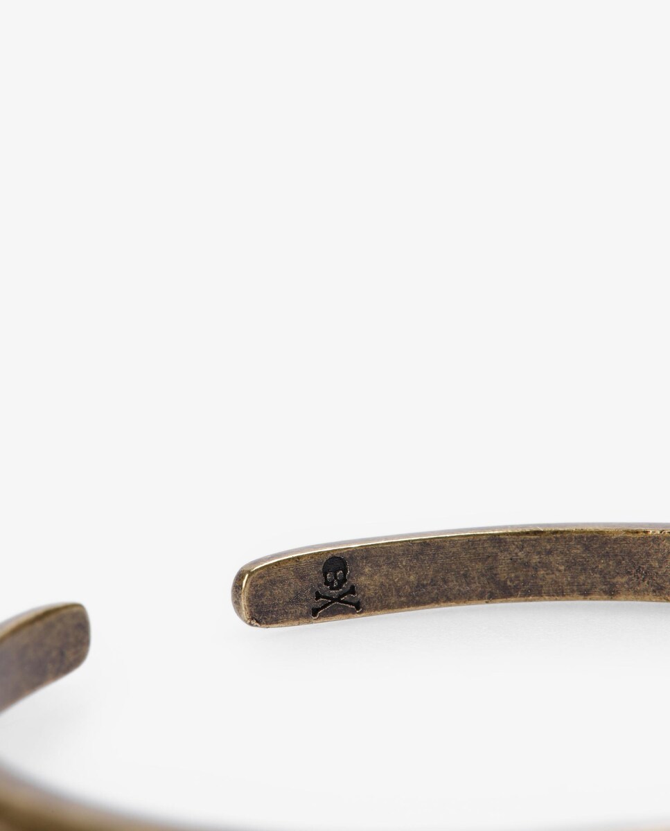 Pulsera de hombre rígida con acabado envejecido y logotipo grabado ...