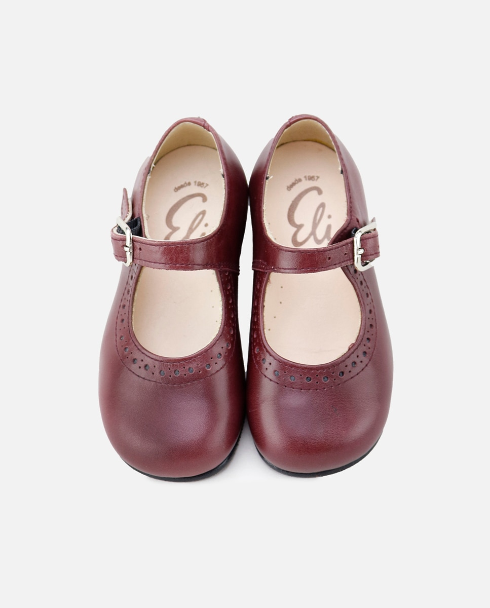 Merceditas de niña en piel color burdeos · Eli 1957 · El Corte Inglés