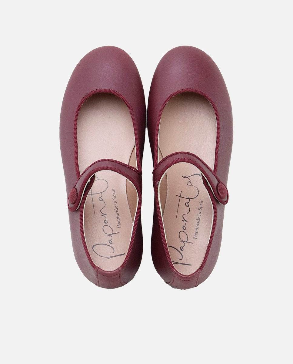 Merceditas de niña en piel color burdeos · Eli 1957 · El Corte Inglés